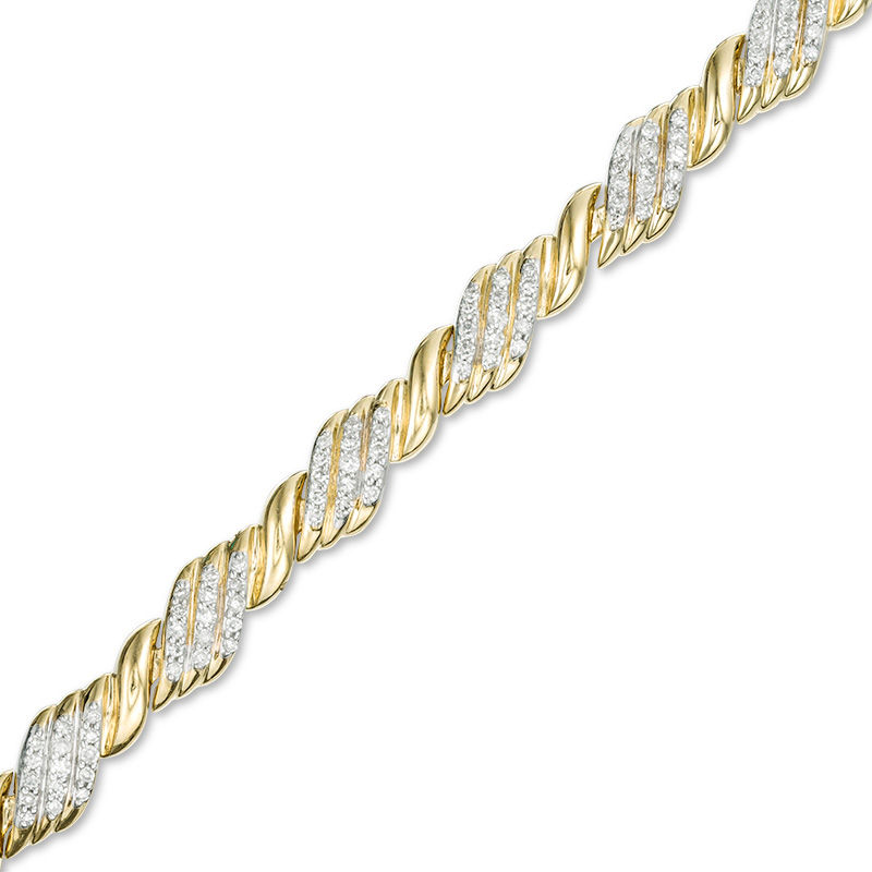 1 CT. T.W. Diamond Rolling Flame Link Bracelet in 10K Gold - 7.25" | Zales